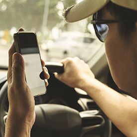 Penalties for Texting While Driving in Texas | Evans Law Firm